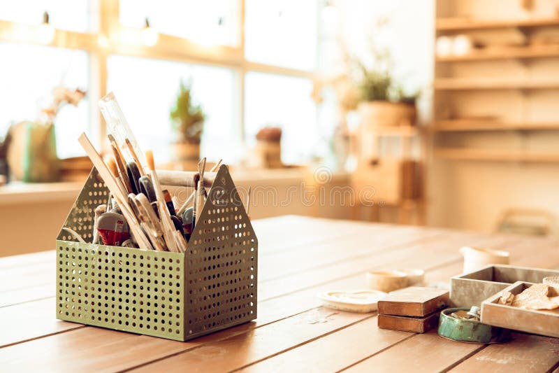Box with Brushes and Pencils on the Table Stock Photo - Image of ...