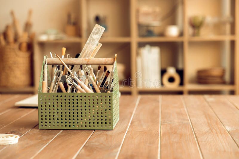 Box with Brushes and Pencils on the Table Stock Photo - Image of ...