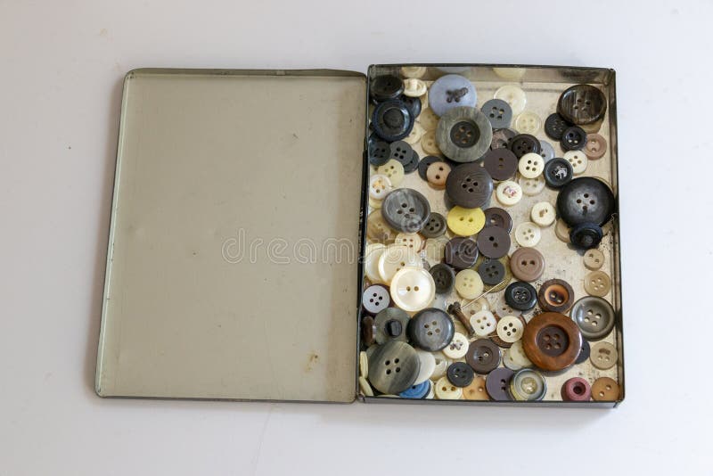 A Box of Buttons stock photo. Image of steel, material - 132834132