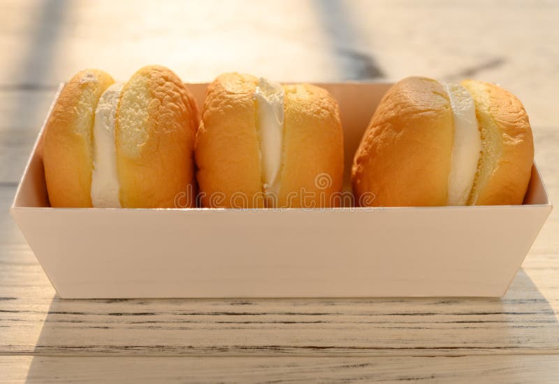 Box of Cakes with Cream Filling in a Sunny Morning Stock Image - Image ...