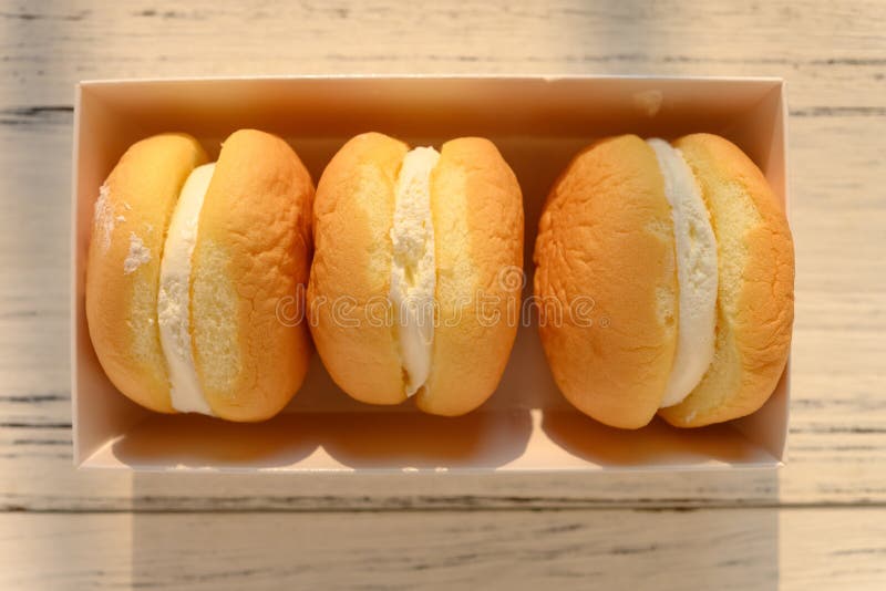 Box of Cakes with Cream Filling in a Sunny Morning Stock Image - Image ...