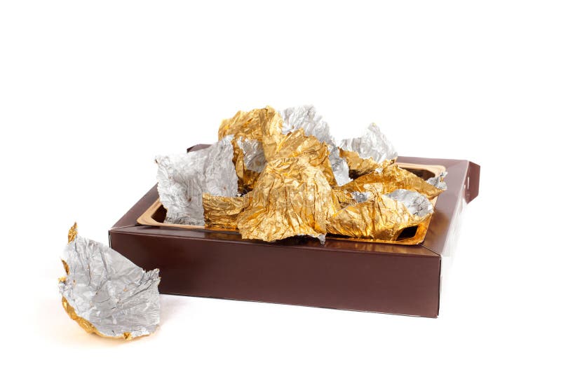 Box and chocolate wrappers stock photo. Image of food - 66977768