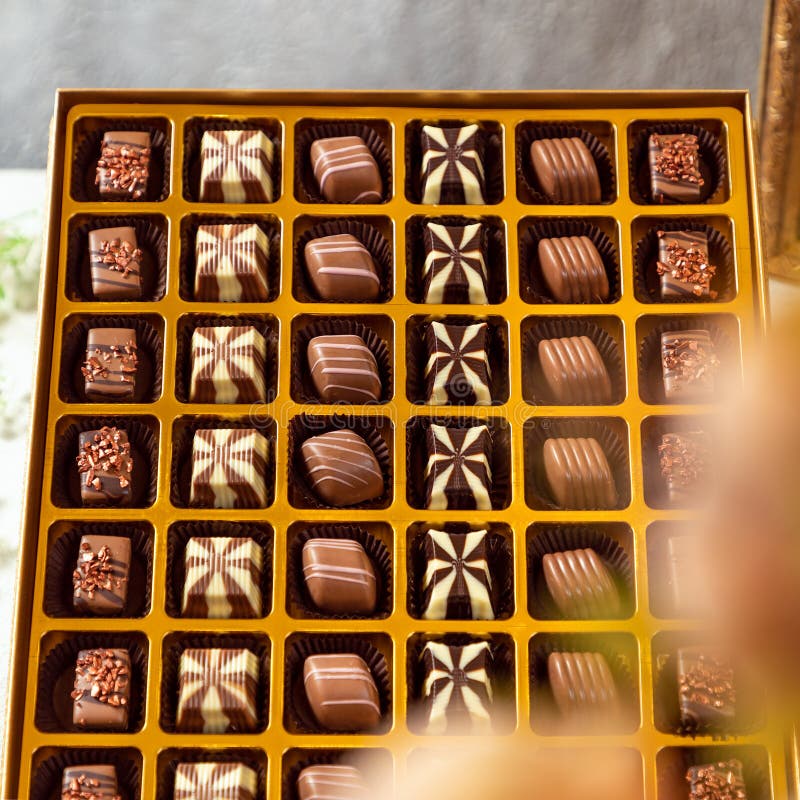 Box of chocolates isolated stock photo. Image of food - 263160770