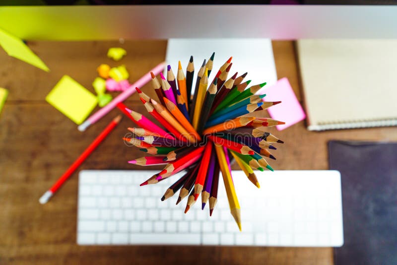 A Box of Colored Pencils Placed on the Desk Stock Photo - Image of desk ...