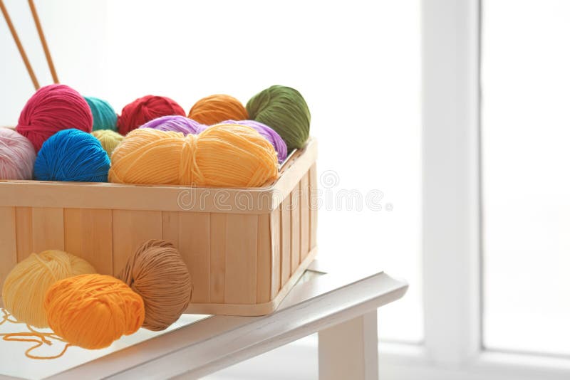 Box with Colorful Knitting Yarns and Needles on Table Indoors Stock ...