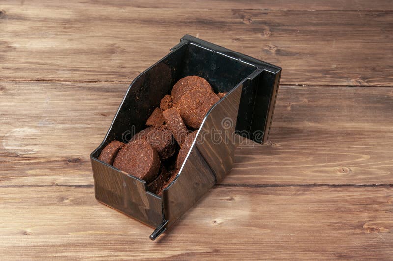 Box with Compressed Coffee Grounds from the Automatic Coffee Maker ...