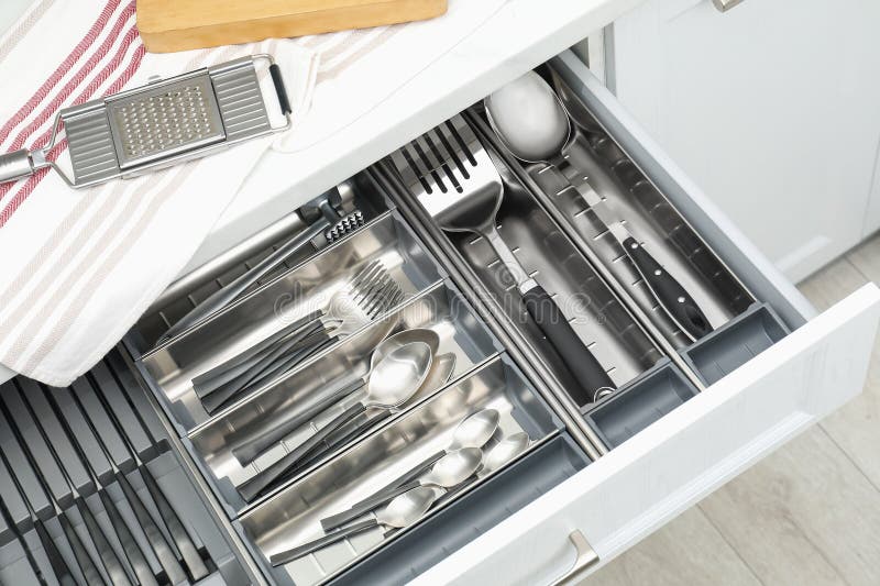 Box with Cutlery in Drawer, Closeup. Kitchen Utensils Storage Stock ...
