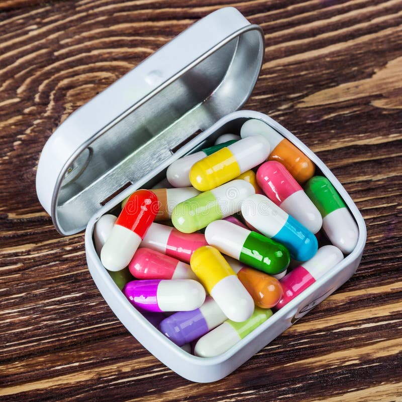 Pills Of Different Colors And A Bottle Of Medicine Stock Photo - Image ...