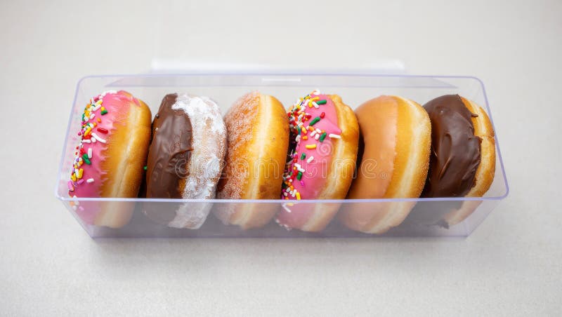Box of Donuts with Whipped Topping and Assorted Glazes Stock ...