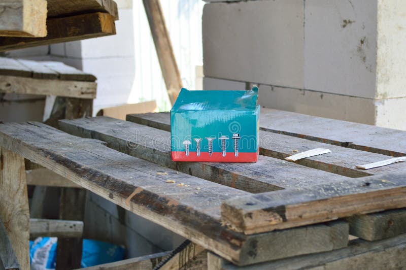 Box with Fasteners Stands on Old Construction Wooden Scaffolding Stock ...