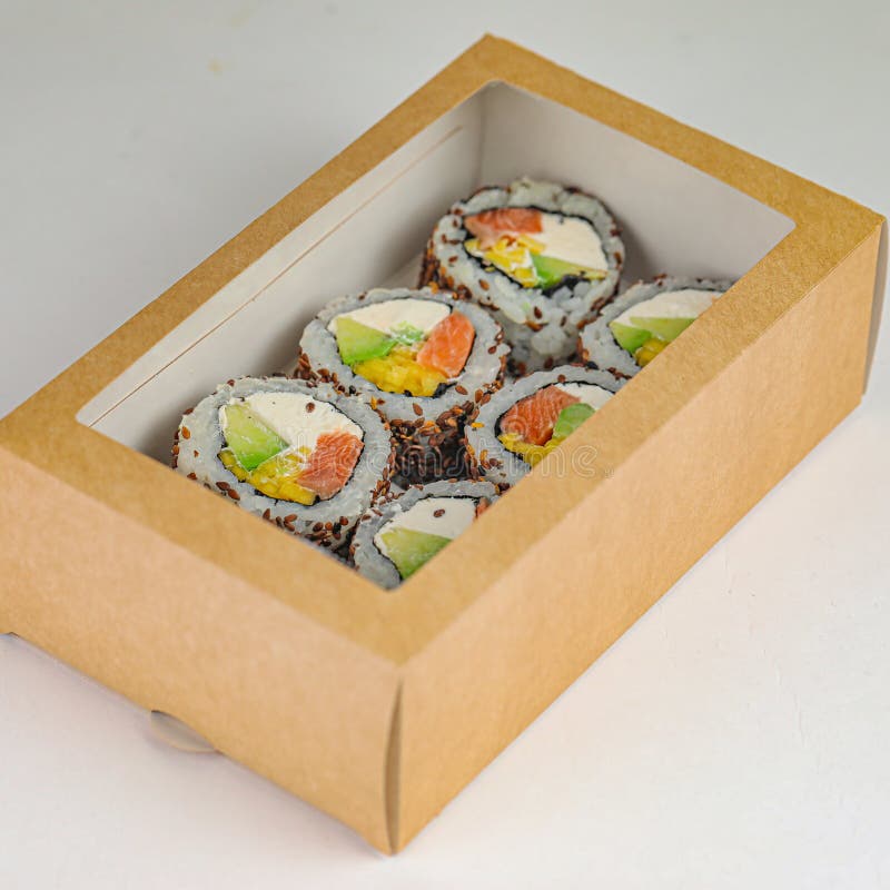 Box of Sushi on Table stock image. Image of meal, rolls - 306170953