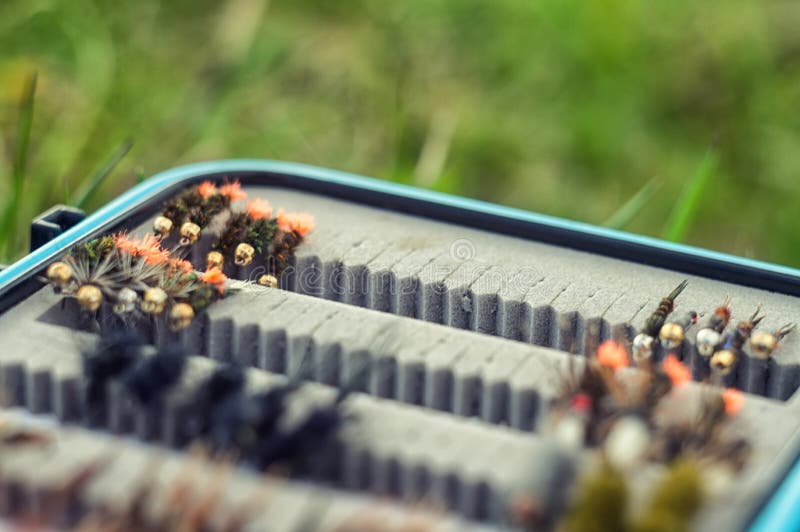 Box with fly-flies stock photo. Image of recreation - 190044002