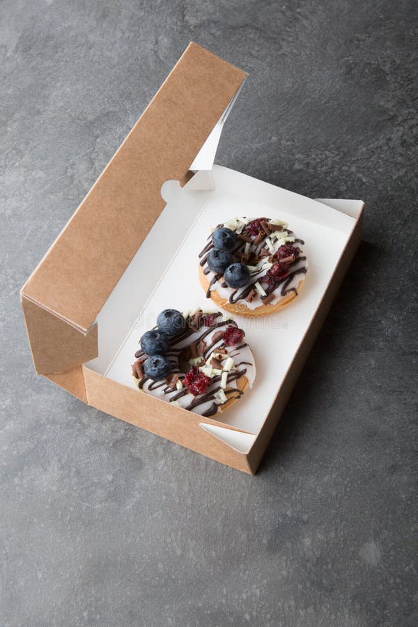Box of Fresh Donuts To Go on a Black Table Stock Image - Image of ...