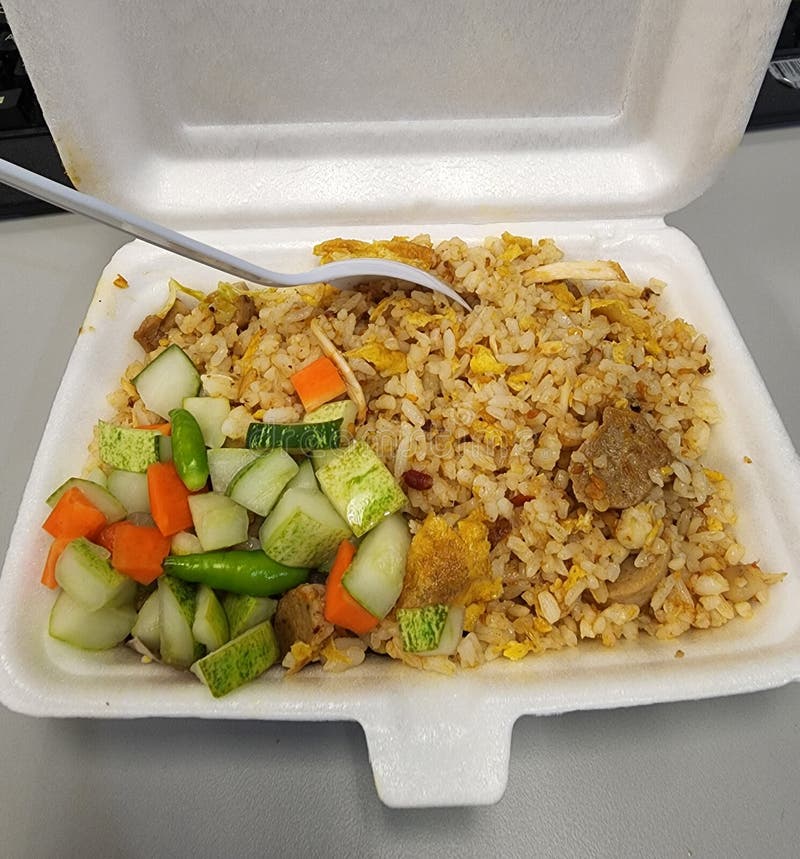 A Box of Fried Rice with Some Pickles Stock Photo - Image of rice ...