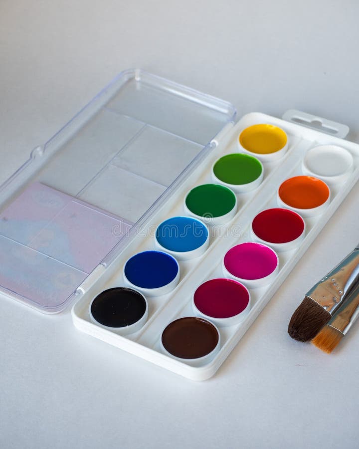 Box with Multi-colored Watercolor Paints and Brushes for Drawing, and a ...