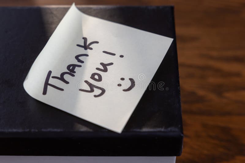 A Box with a Note that Says "Thank You" Written on it Stock Image ...