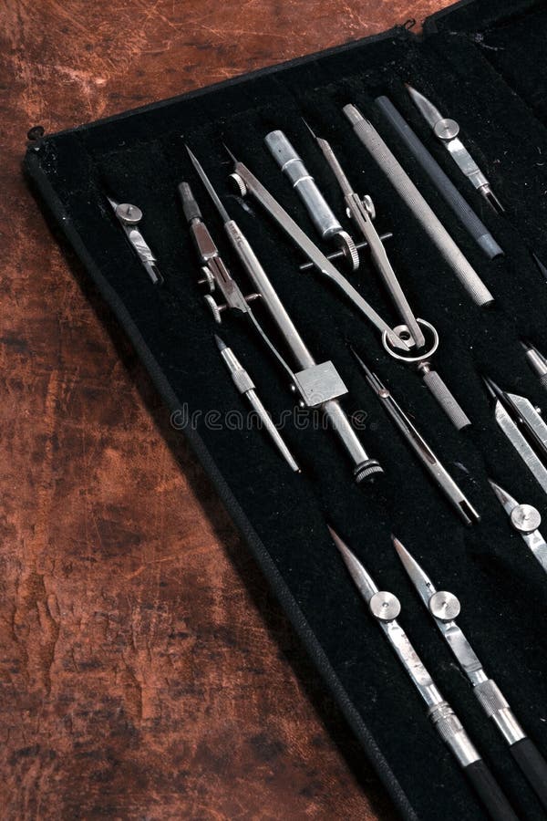 Box with a Set of Protractors on Brown Table Stock Image - Image of ...