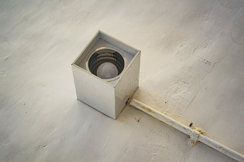 A Box-shaped Lamp with Cables Wrapped in Pipes Stock Image - Image of ...