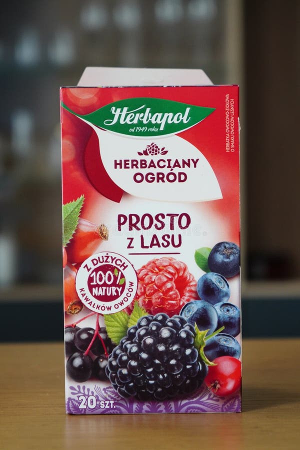 The Box is Sitting on the Table and Contains Berries and Other Fruit ...