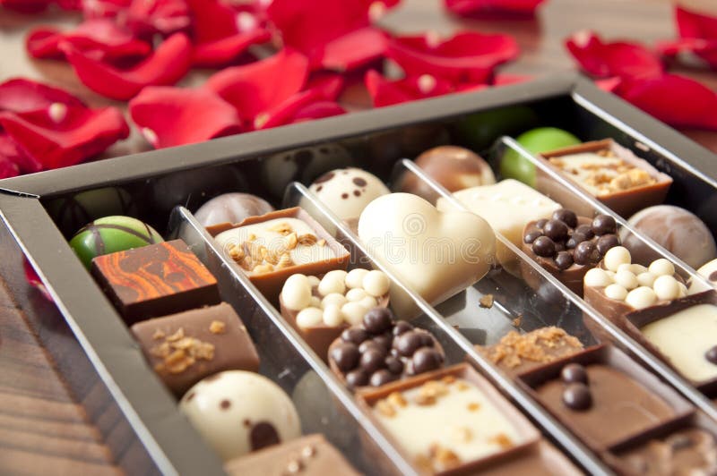 Box of Tasty Chocolates among Rose Petals - a Romantic Valentine Stock ...
