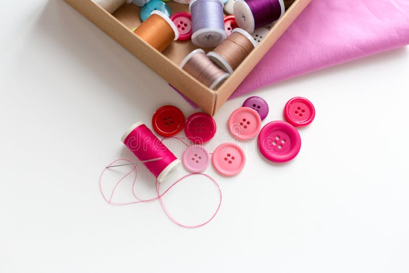 Box with Thread Spools and Sewing Buttons on Table Stock Image - Image ...