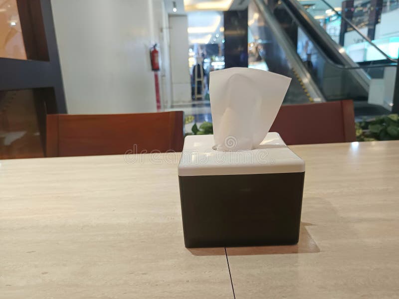 Box of Tissues on the Dining Table of a Wooden Table Restaurant Stock ...