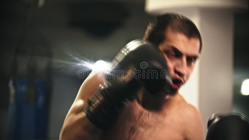Boxing - Two Sweaty Men Having a Training Fight in the Gym - One of ...