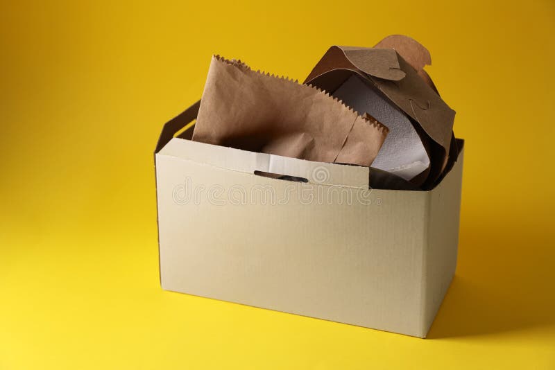 Box with Waste Paper on Yellow Background Stock Image - Image of paper ...