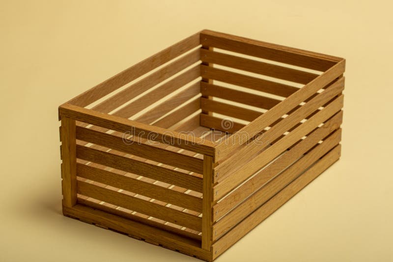 A Box of Wooden Slats on a Beige Background Close-up Stock Photo ...
