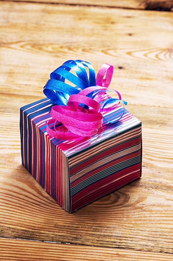 Box wrapped with a bow stock photo. Image of bound, cardboard - 45122258