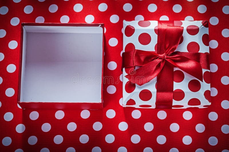 Boxed Present on Polka-dot Red Textile Holidays Concept Stock Photo ...