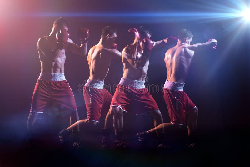 The Boxer Boxing in a Dark Studio Stock Image - Image of body, muscle ...