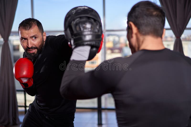 Boxer training with coach stock photo. Image of punch - 173932148
