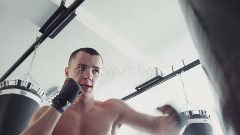 Boxer Hitting the Punching Bag Stock Footage - Video of healthy, action ...