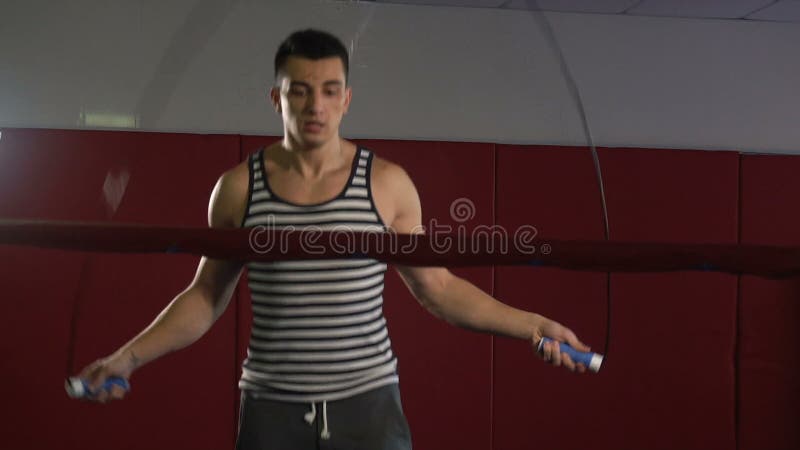 Man Jumping Rope at the Gym. Male Boxer Legs Jumps Rope Stock Footage ...
