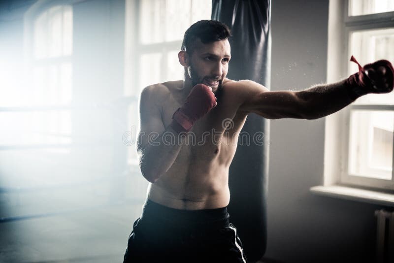 Boxer Preparing for a Hard Fight Stock Photo - Image of boxer, muscular ...