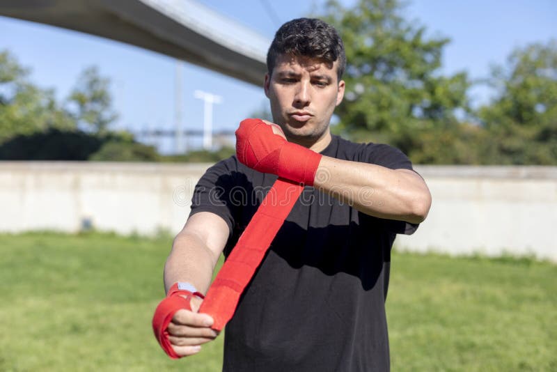 Boxer Preparing for Training with Forearm Bandage Outside Stock Photo ...