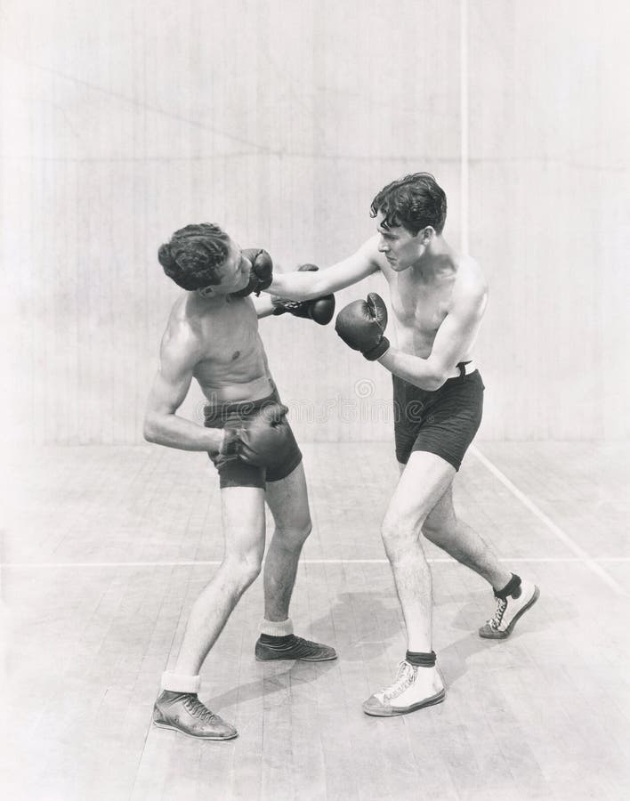 Boxer Throwing a Right Hook Stock Photo - Image of boxers, athlete ...