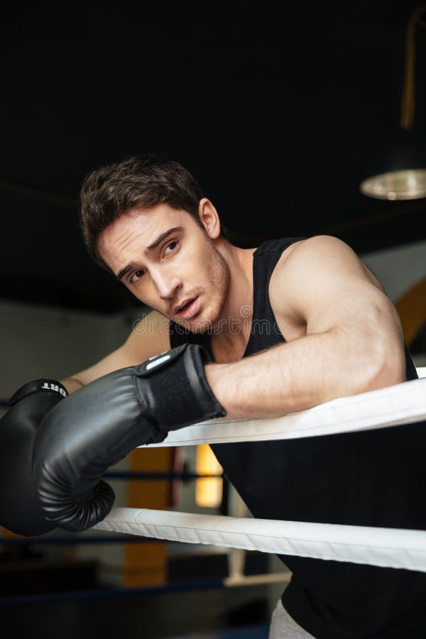 Tired Boxer Wiping the Sweat while Sitting on Ring Stock Photo - Image ...