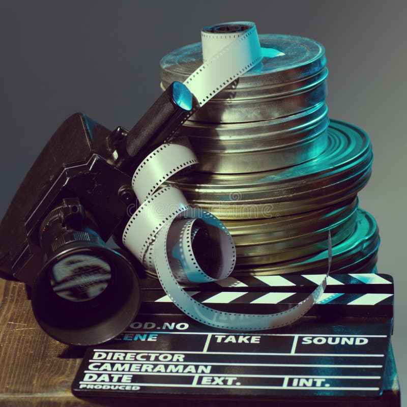Boxes with the Camera Films and Film Clapper Lie on the Board Stock ...
