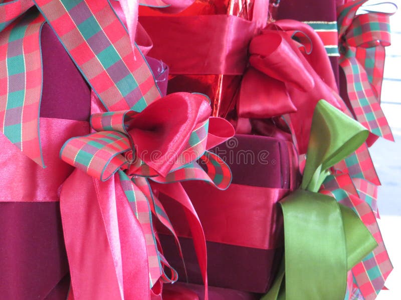 Boxes of Christmas Presents Wrapped with Ribbons. Stock Photo - Image ...
