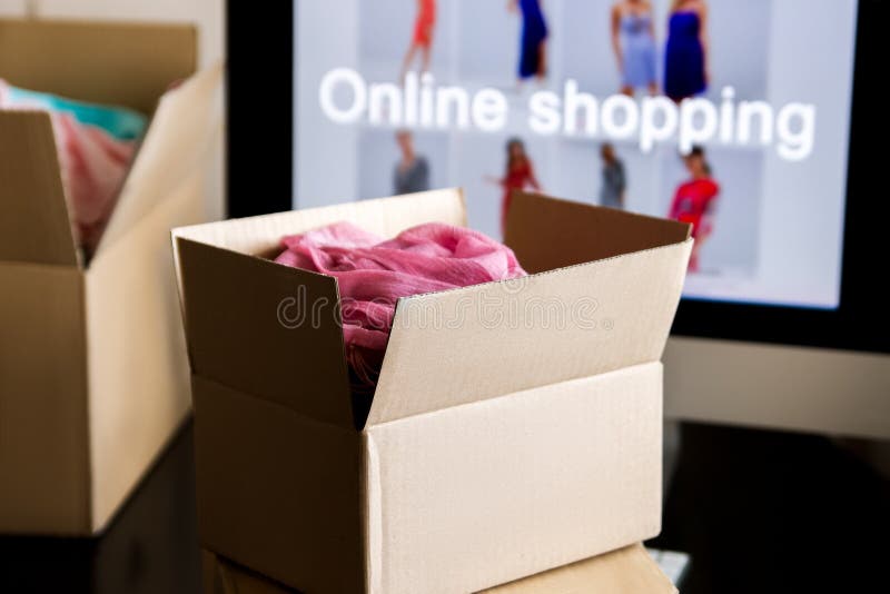 Boxes with Clothes. Computer Screen.Boxes with Clothes. Computer Screen ...