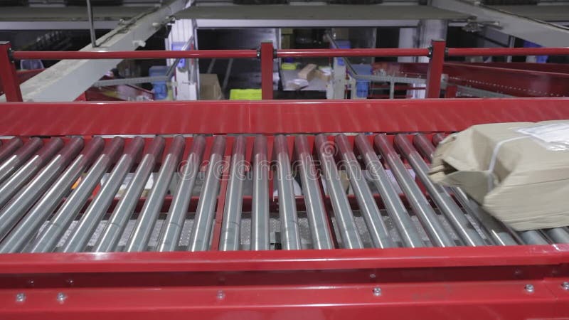 Conveyor Rollers Boxes stock footage. Video of belt - 178471156