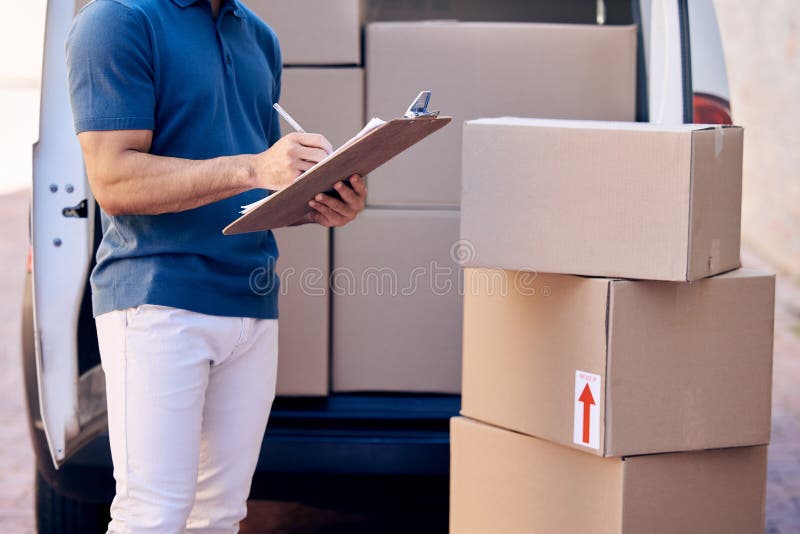 Boxes, Ecommerce and Courier Driver with Clipboard for Information of ...