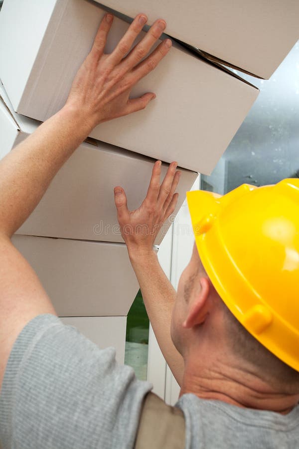Boxes falling on worker stock image. Image of house, body - 35055831