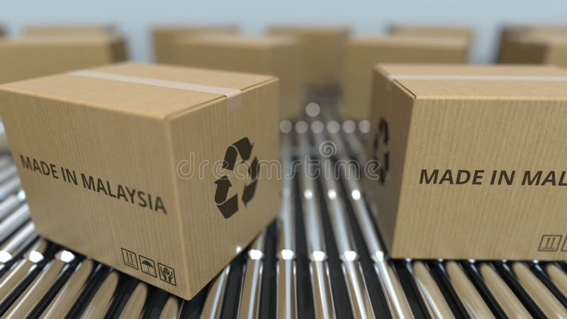 Boxes with MADE in MALAYSIA Text on Roller Conveyor. Malaysian Goods ...