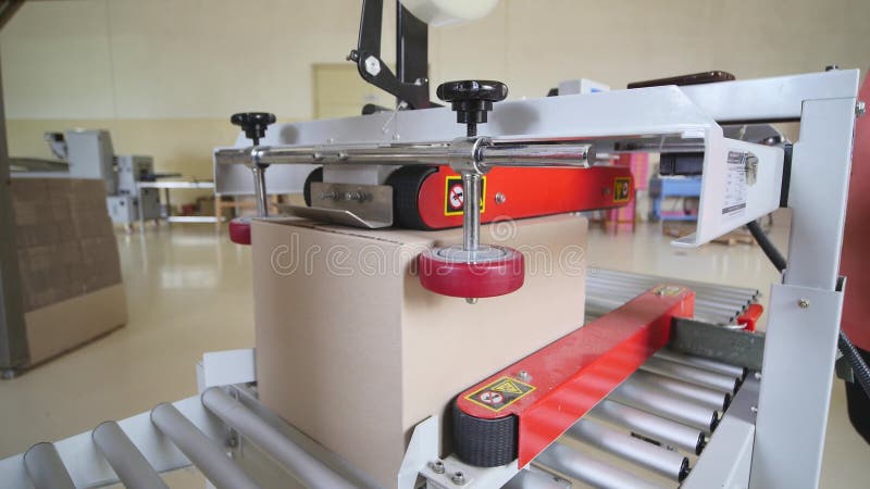 Packing Boxes Along Conveyor Stock Image - Image of factory, high ...