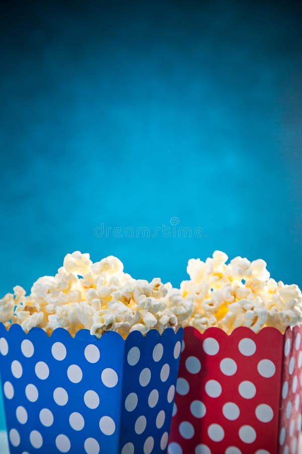 Boxes of Popcorn on Blue Background. Stock Image - Image of digital ...