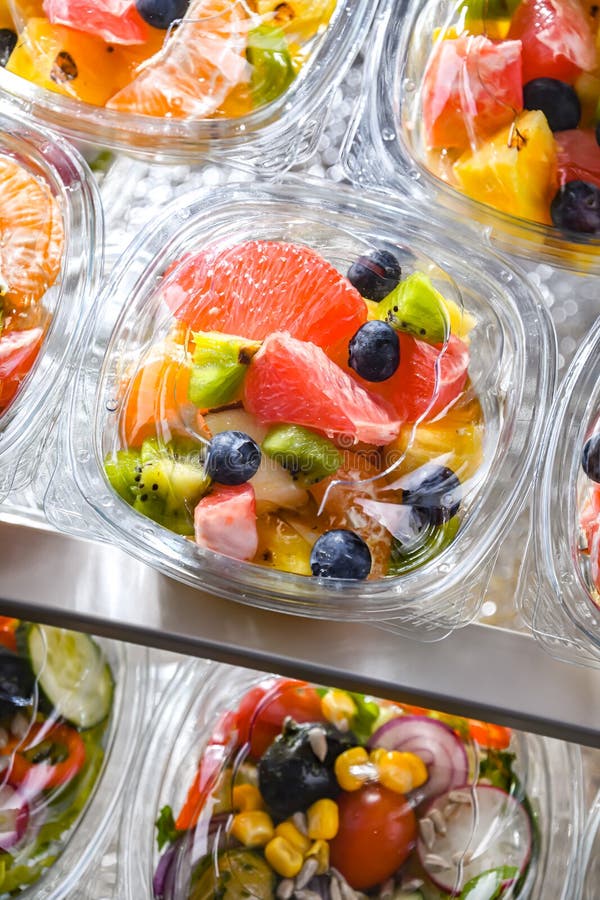 Pre-packaged Fruit Salads Displayed in a Commercial Refrigerator Stock ...