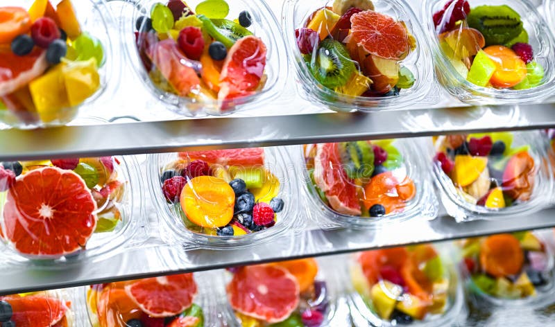 Boxes with Pre-packaged Fruit Salads in a Commercial Fridge Stock Image ...